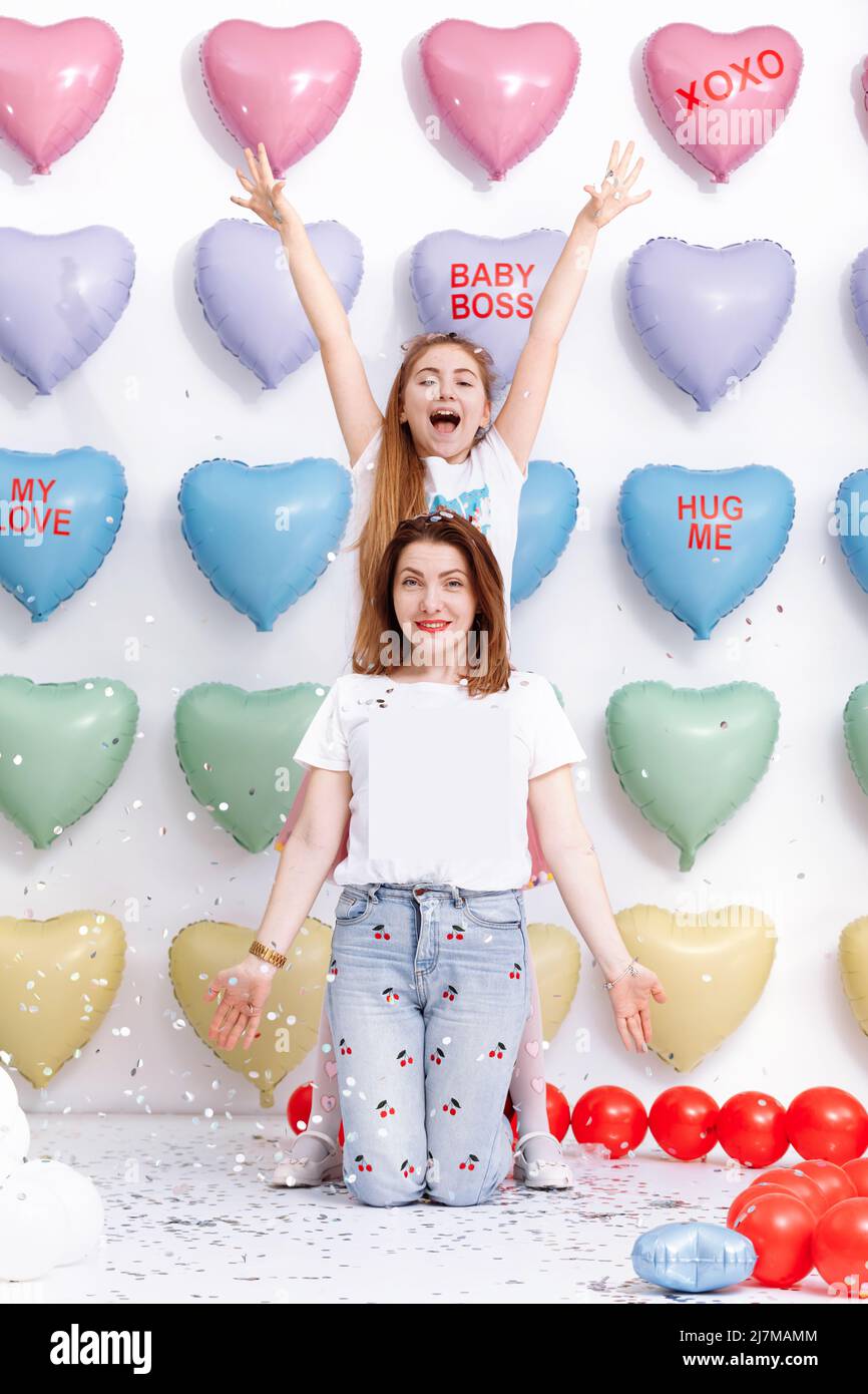 beautiful young mother and a pretty little daughter, the family on a ...