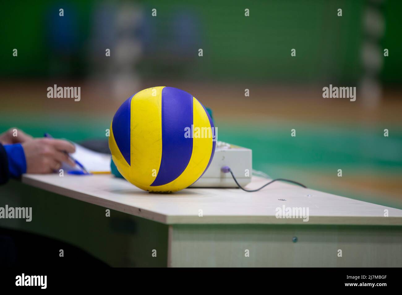 Volleyball on the referee's table Stock Photo - Alamy