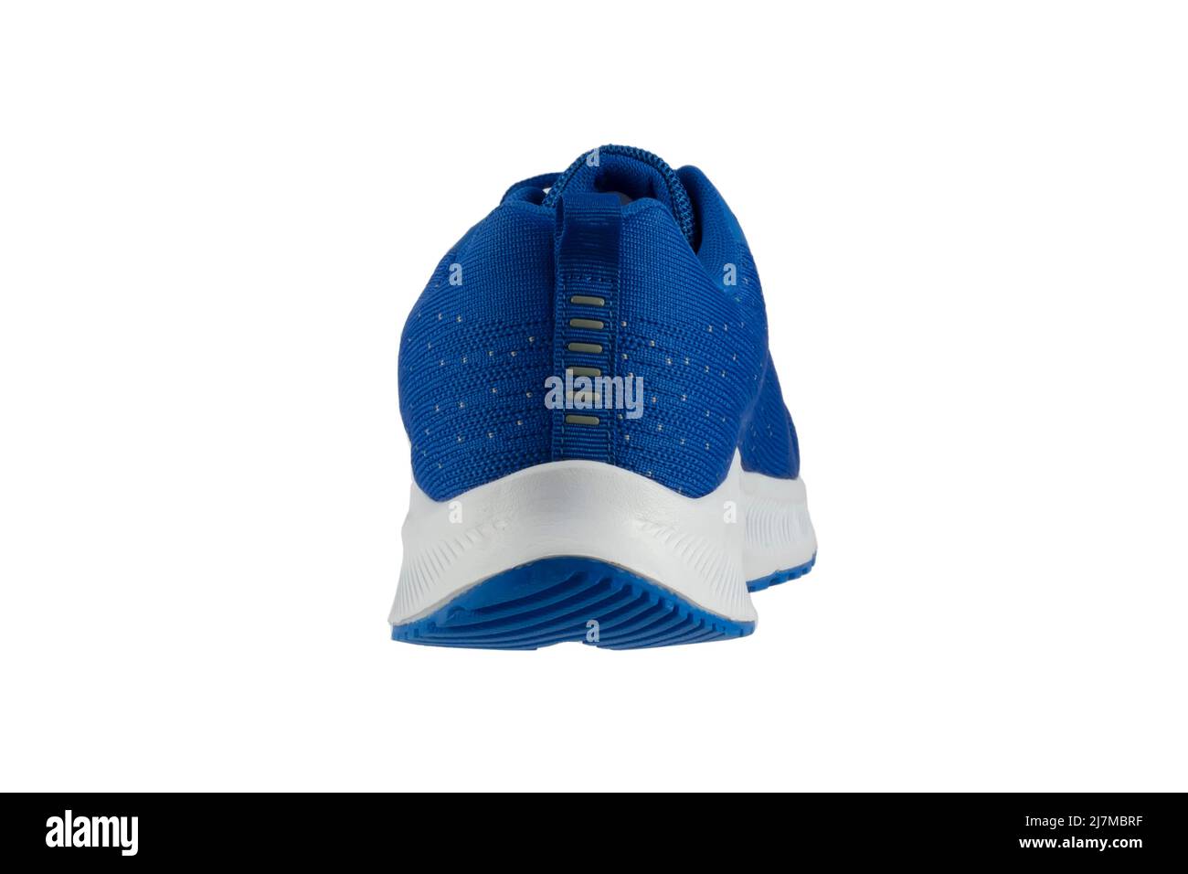 Blue sneaker made of fabric with a white sole on a white background ...