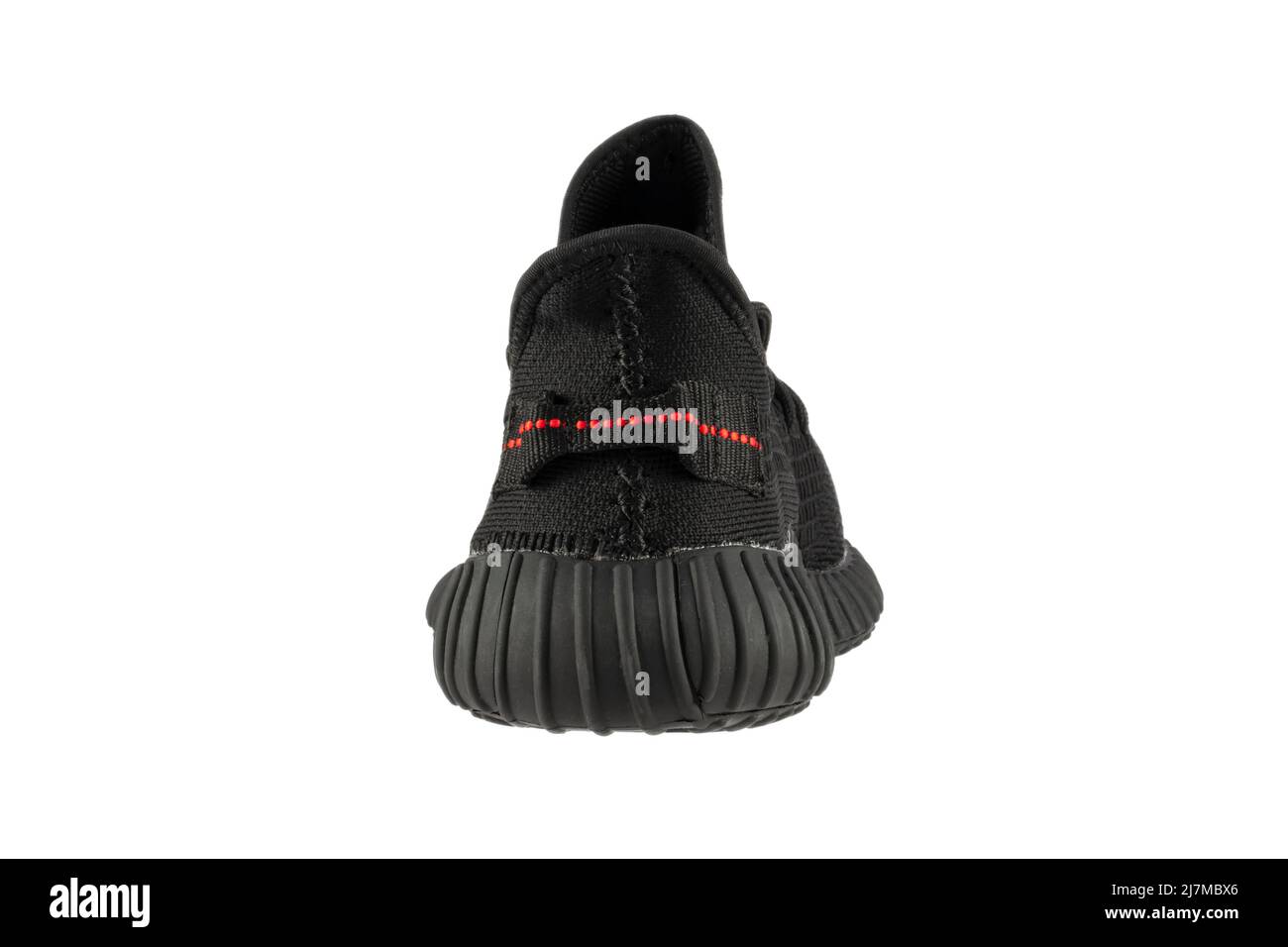 Black rag sneaker on a white background Stock Photo - Alamy