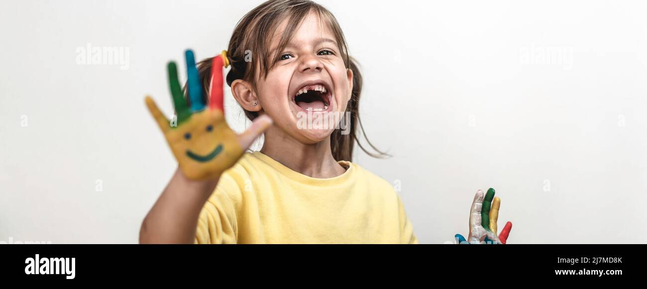 Horizontal banner or header with happy toothless little girl with ...