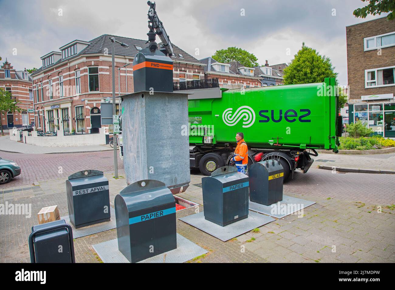 Netherlands, Arnhem; a garbage truck is collecting the pmd waste ...