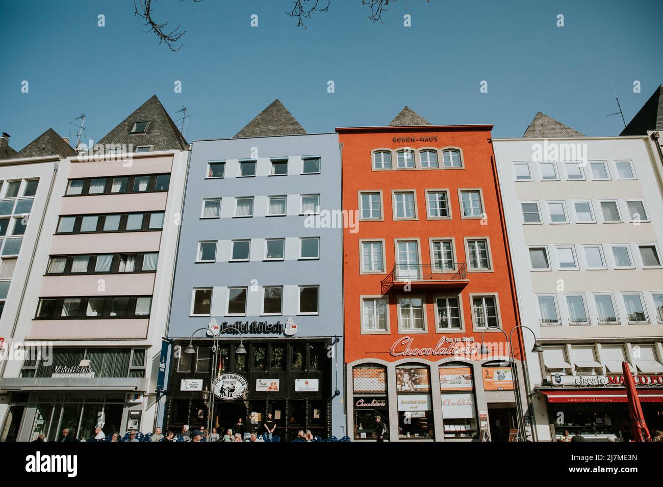 Row of shops in Cologne, Germany Stock Photo - Alamy