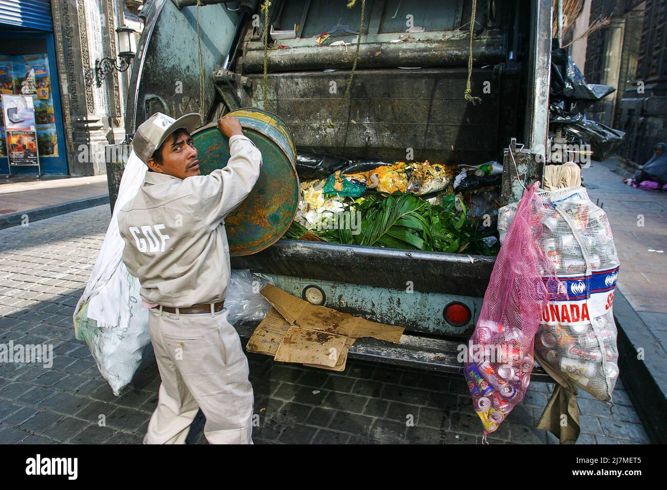 Mexico - men are collecting garbage in the center of Mexico-City Stock ...