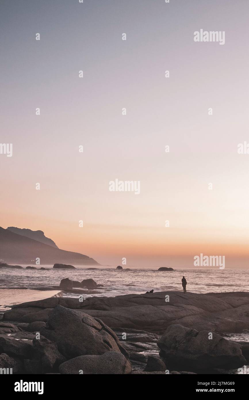 Sunset at Camps Bay beach in Cape Town Stock Photo - Alamy