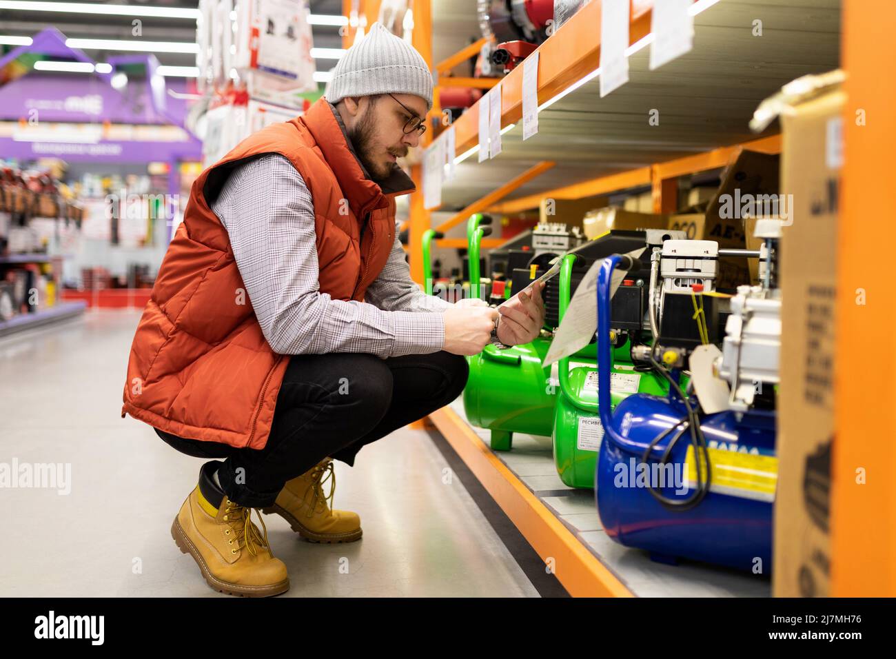 Woman in hardware store chooses hi-res stock photography and images - Alamy