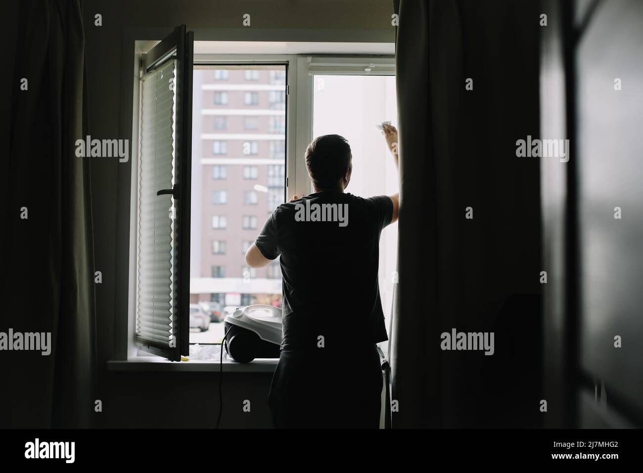 washing and cleaning window at home. Housework and housekeeping, home ...