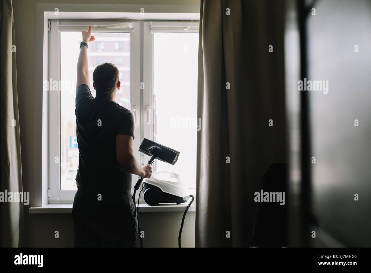 washing and cleaning window at home. Housework and housekeeping, home ...