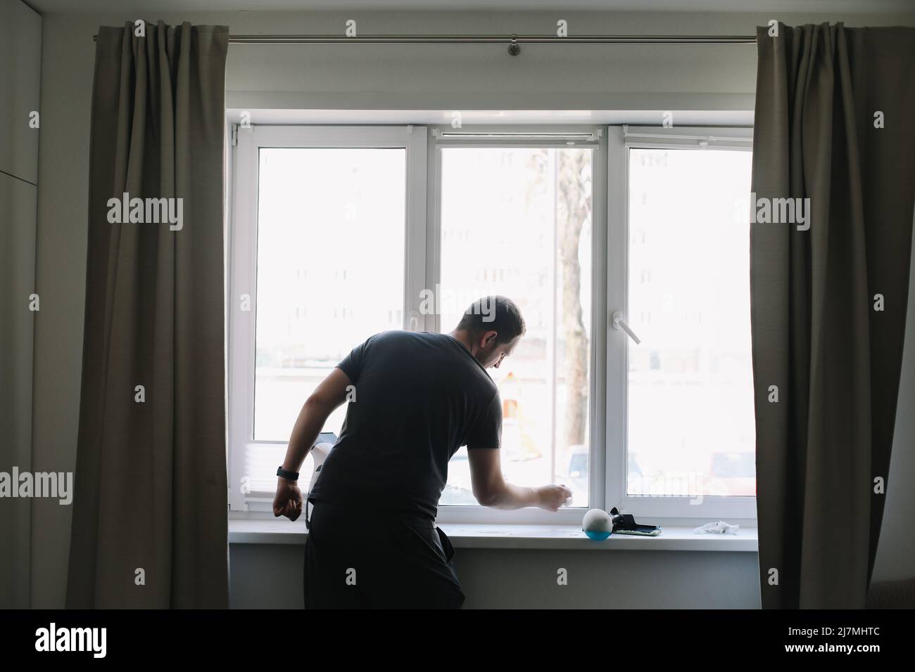 washing and cleaning window at home. Housework and housekeeping, home ...