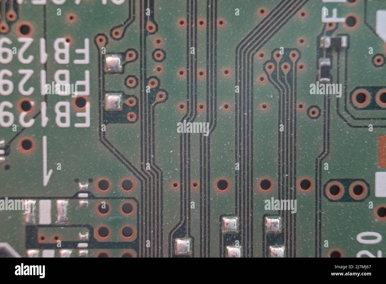 A closeup on part of a DVD player circuit board Stock Photo - Alamy