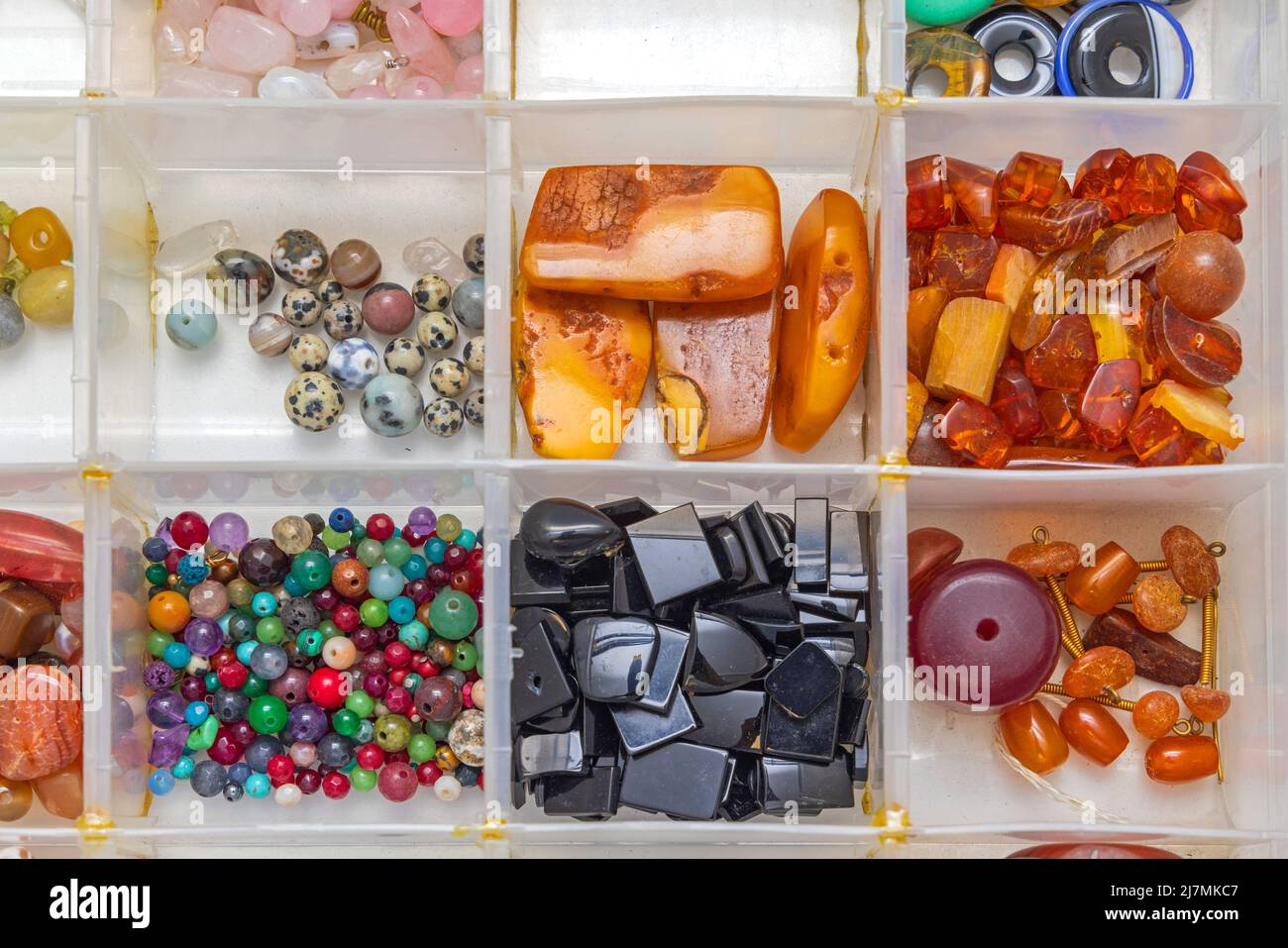 Amber Gems Craft Material in Organizer Tray Box Stock Photo - Alamy