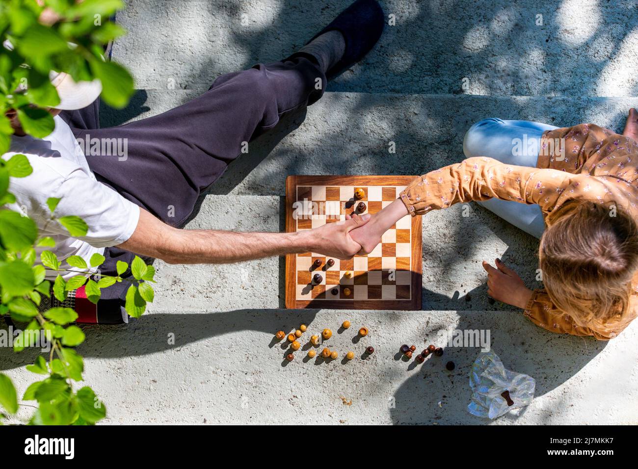 Chess Players Shake Hands At The End Of A Game Stock Photo - Alamy
