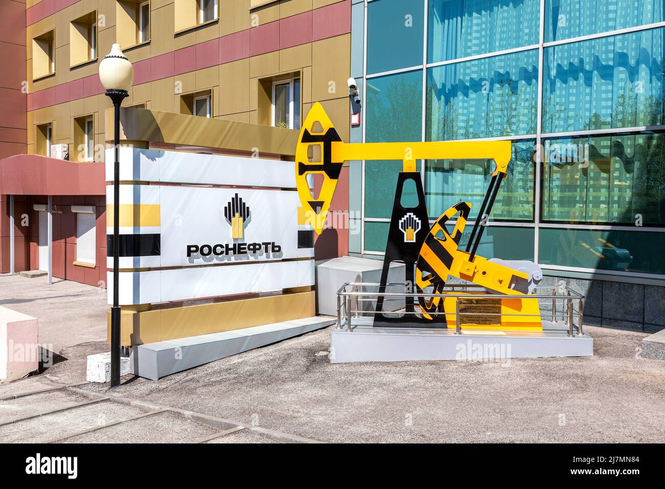 Samara, Russia - May 3, 2022: Model of Oil pump jack next the office ...