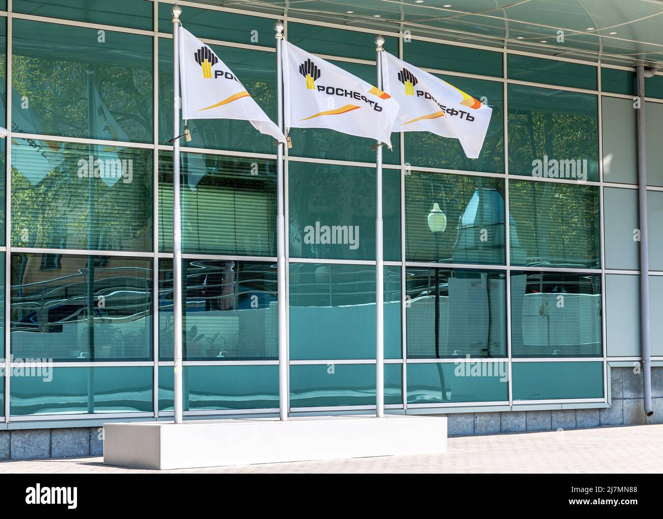 Samara, Russia - May 3, 2022: Flags of Rosneft oil company against the ...