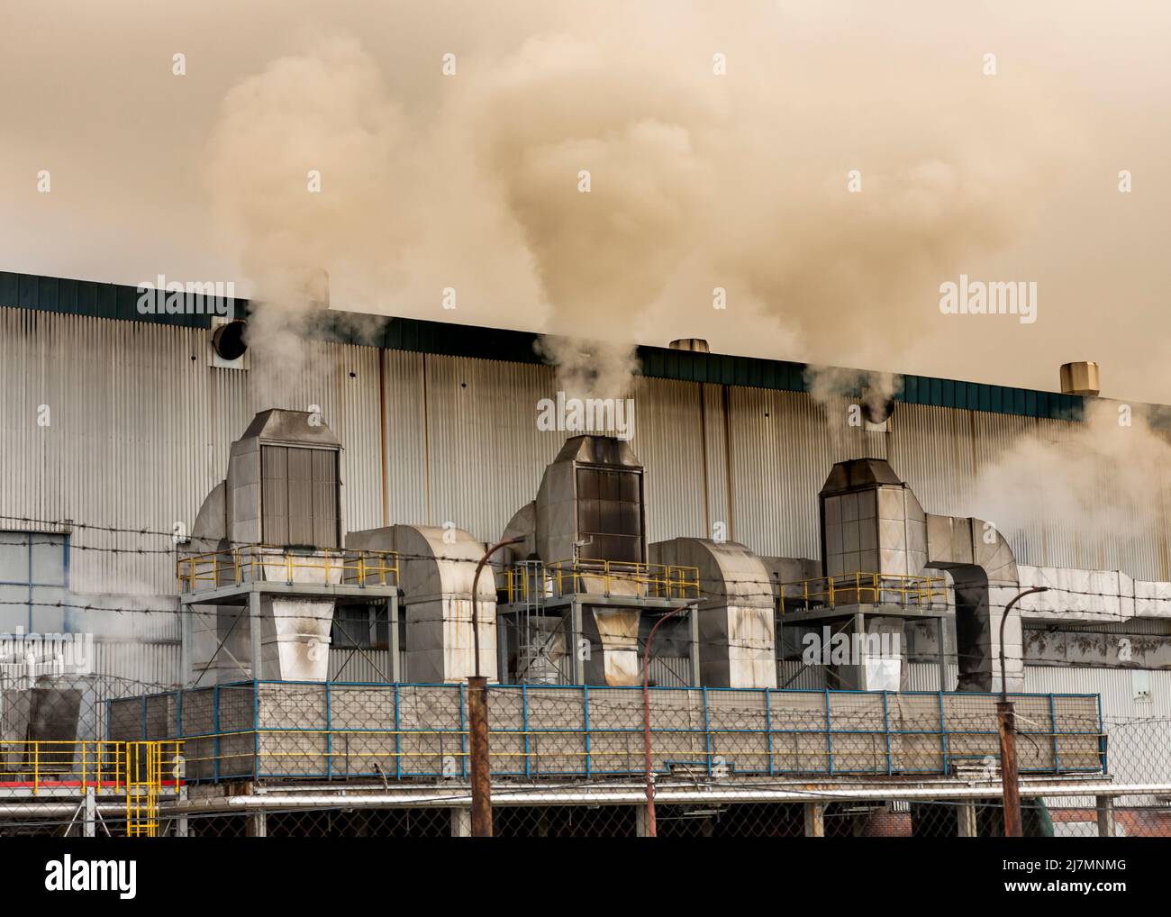 Air pollution from power plant chimneys. Deadly smoke emmiting from the ...