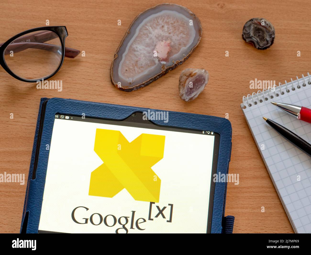 In this photo illustration X Development LLC. owned by Alphabet Inc ...