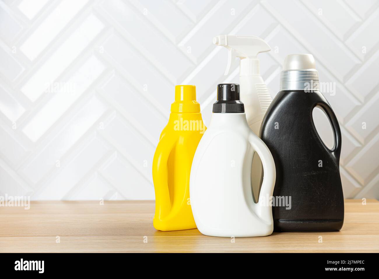 cleaning product on a colored background side view. Professional ...