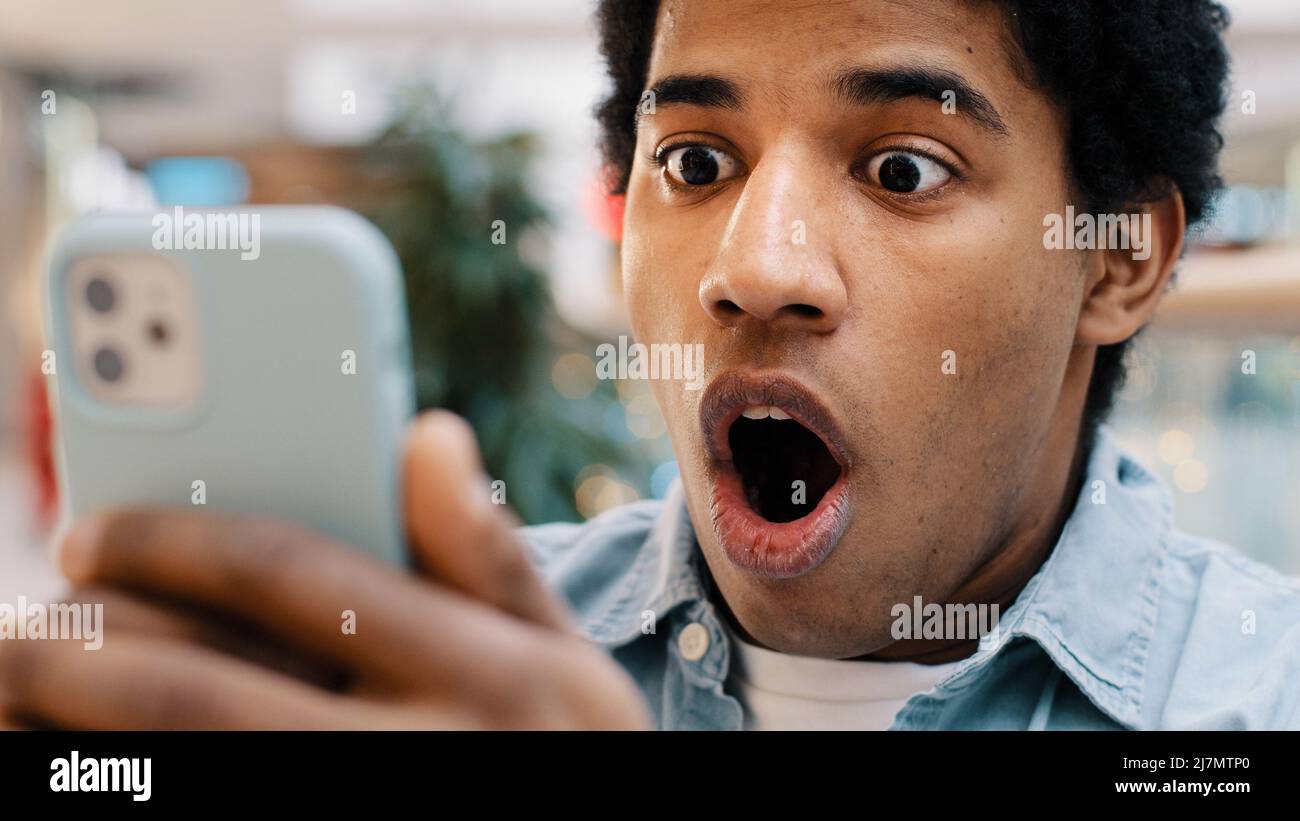 African american guy surprised by message received wins online bets ...