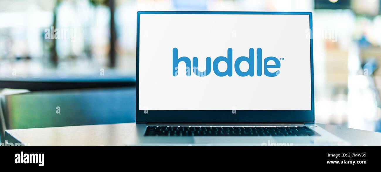 POZNAN, POL - DEC 8, 2021: Laptop computer displaying logo of Huddle, a ...