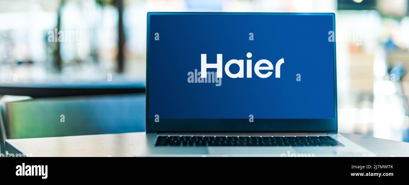 POZNAN, POL - FEB 25, 2022: Laptop computer displaying logo of Haier ...