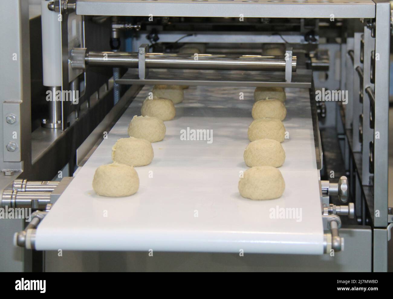 A Food Machine Two Lane Crimper for Filled Products Stock Photo - Alamy