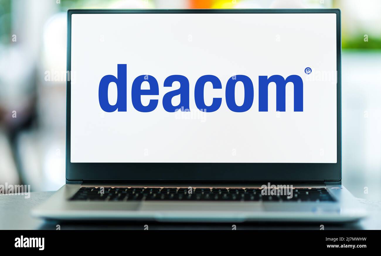 POZNAN, POL - DEC 8, 2021: Laptop computer displaying logo of Deacom ...