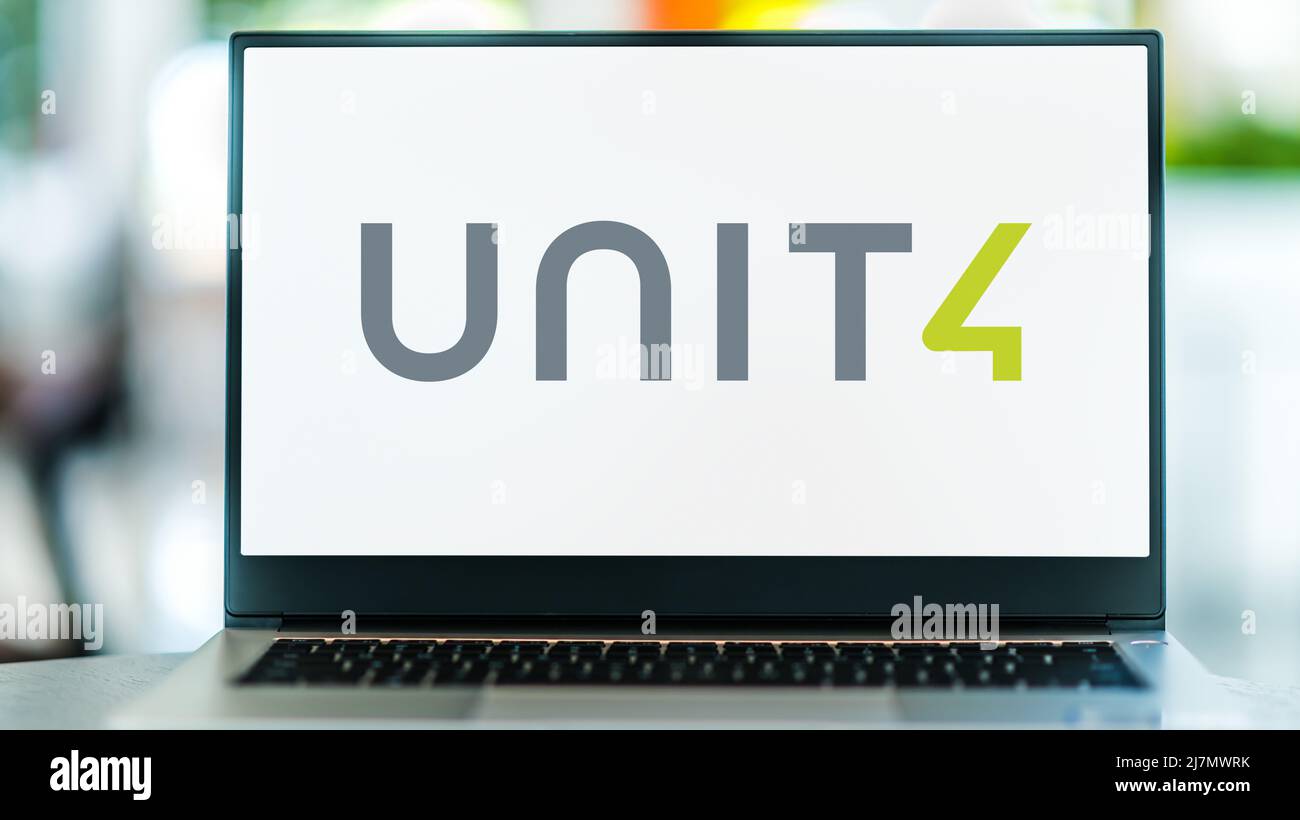 POZNAN, POL - DEC 8, 2021: Laptop computer displaying logo of Unit4, a ...