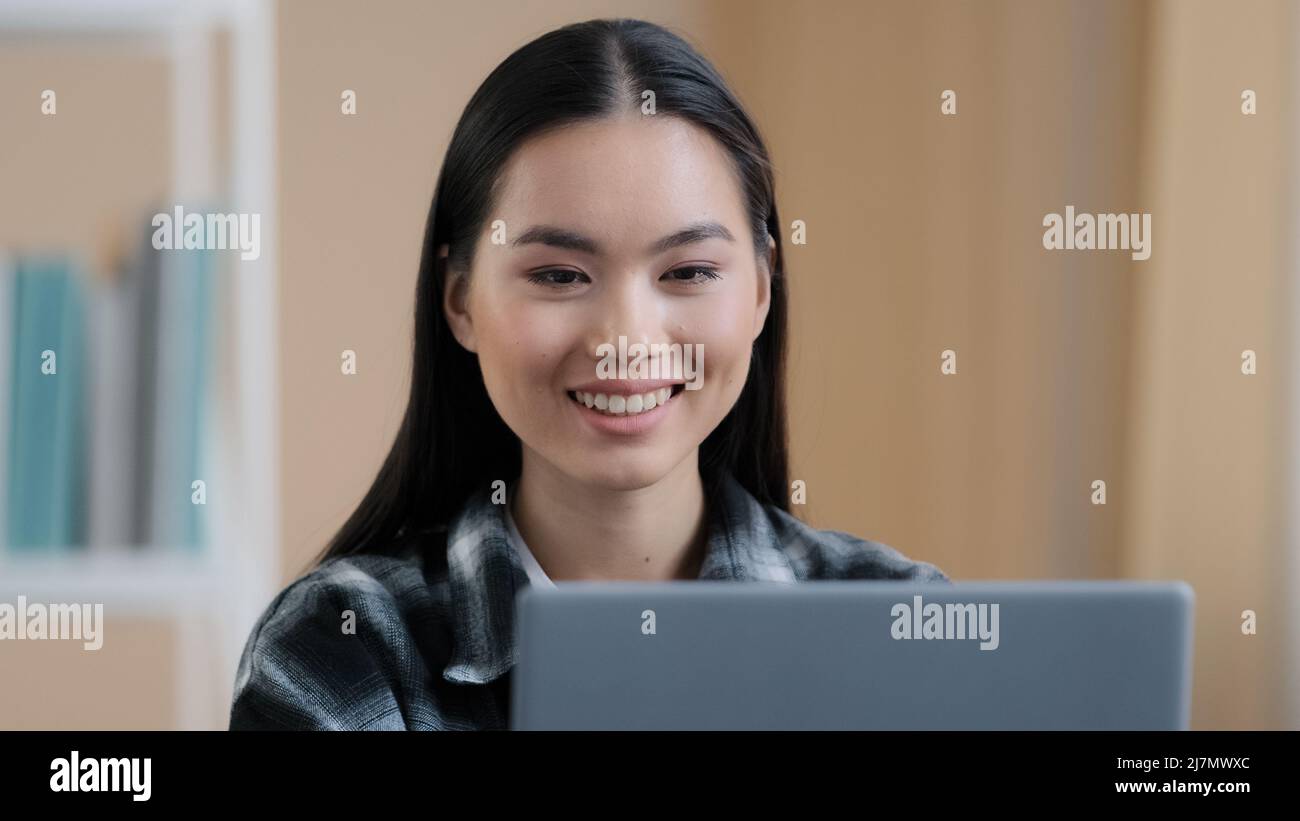 Portrait asian smiling satisfied girl user student freelancer buyer ...