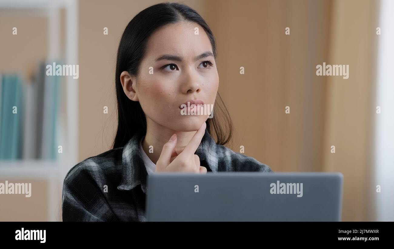 Asian business woman think computer hi-res stock photography and images ...