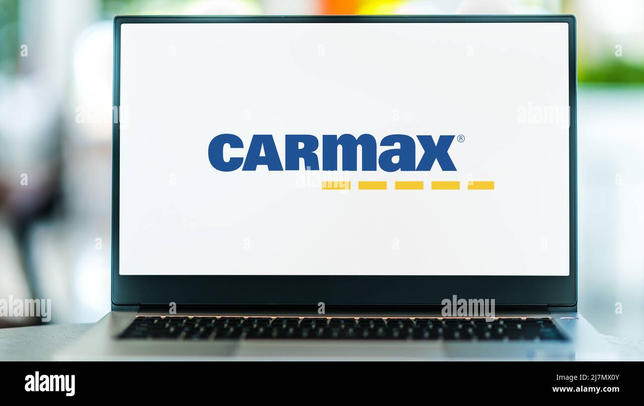 POZNAN, POL - FEB 25, 2022: Laptop computer displaying logo of CarMax ...