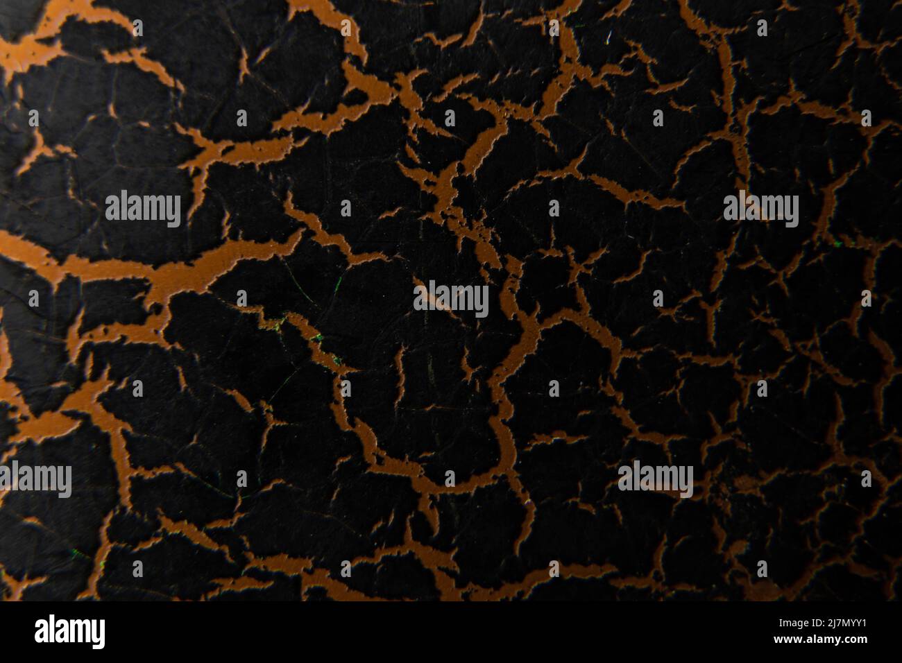 brown paint with cracked effect as background close-up, brown paint ...