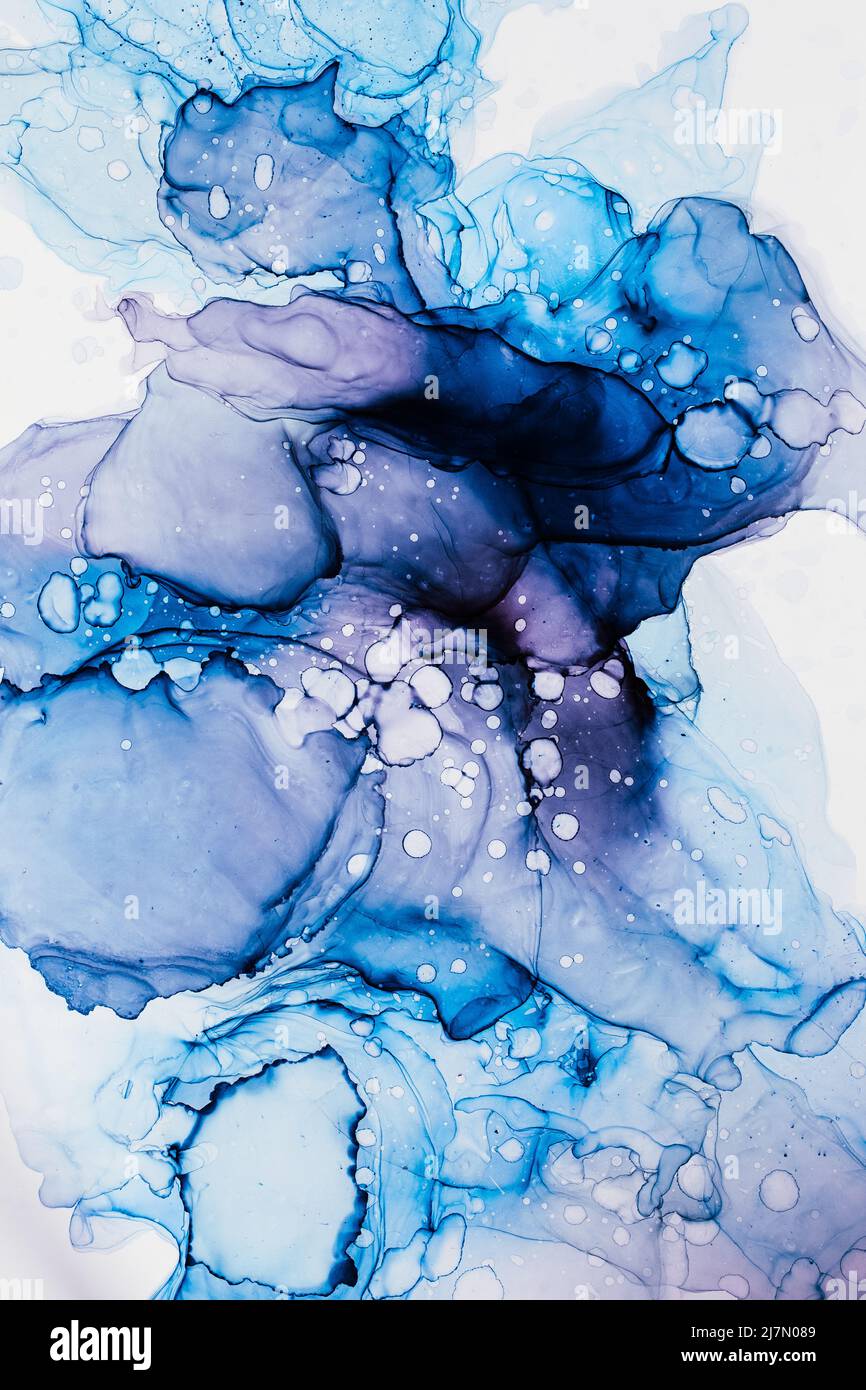 Abstract alcohol ink background in blue azure tones with golden ...