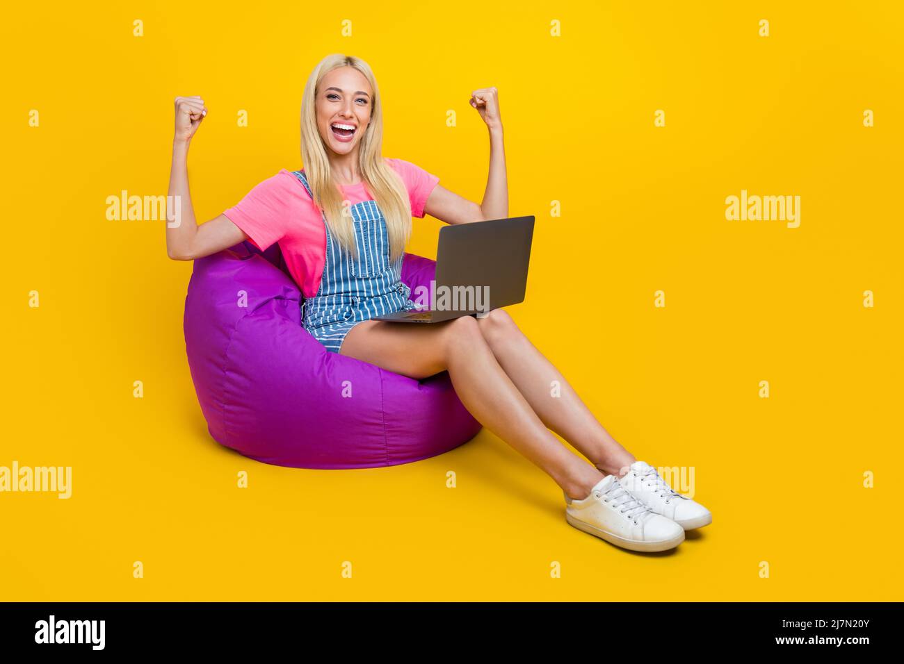 Full body portrait of delighted excited person raise fists success ...