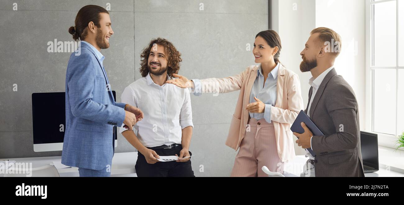 Banner view of smiling multiracial businesspeople cooperate in office ...