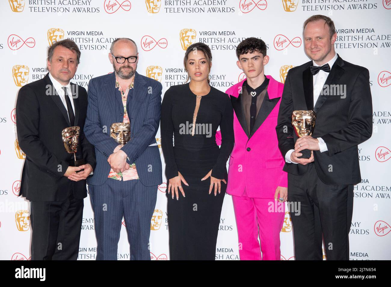 Presenters Nicole Lecky (C) and Joe Locke (2R) pose in the winner's ...