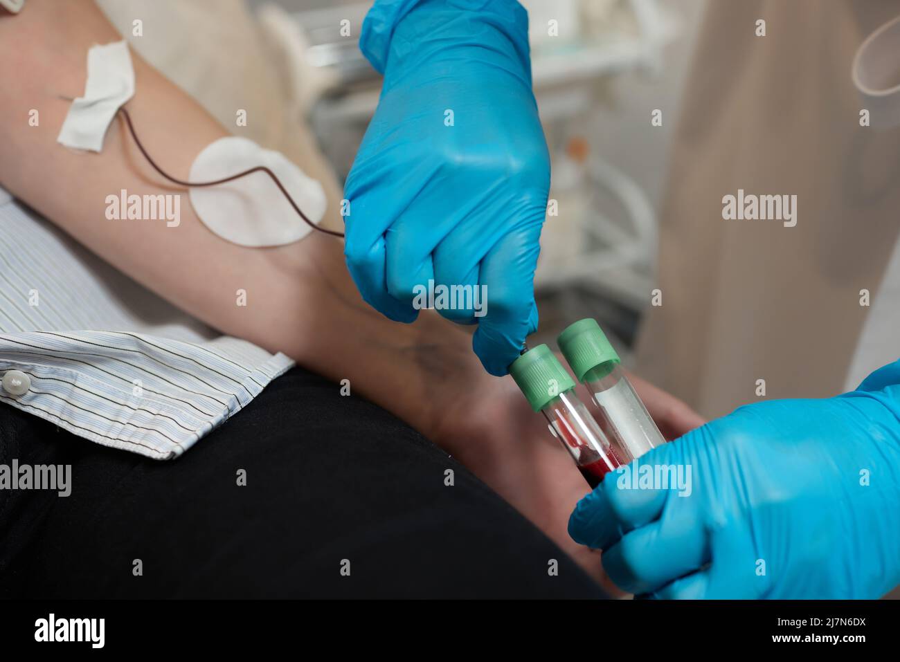 Young woman in blood transfusion concept hand Stock Photo - Alamy