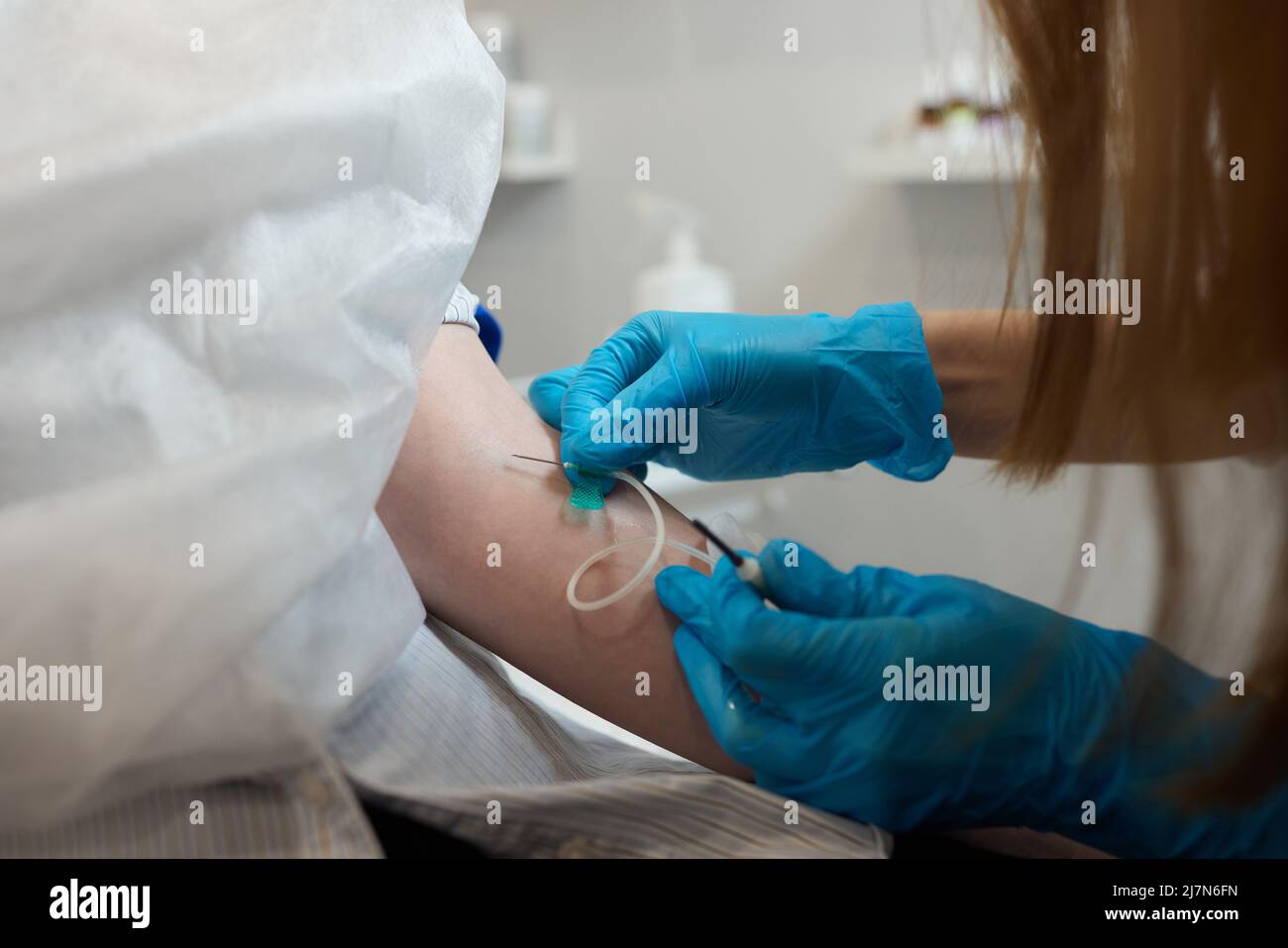 Young woman in blood transfusion concept hand Stock Photo - Alamy