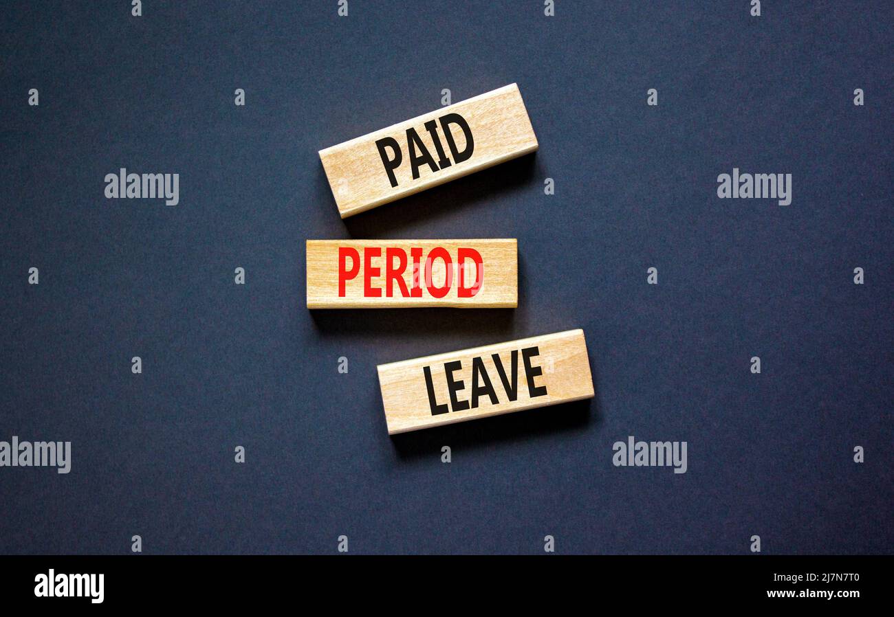 Paid period leave symbol. Concept words Paid period leave on wooden ...