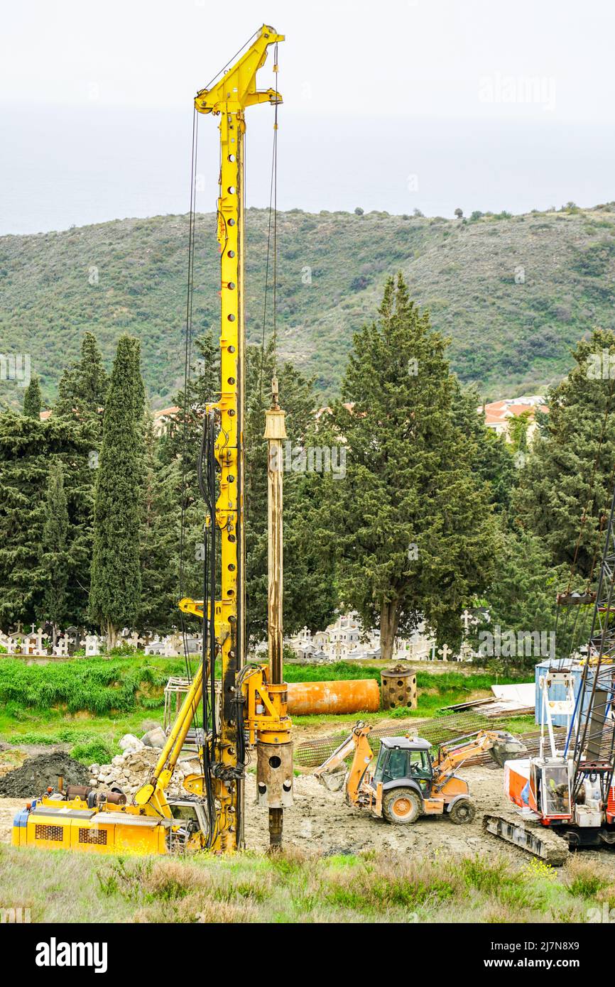 Rotary drilling rig at the construction site, construction of bored ...