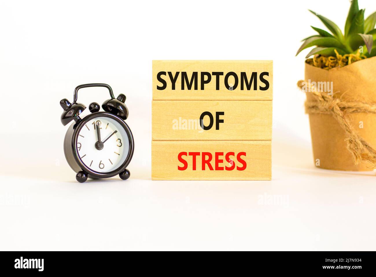 Symptoms of stress symbol. Concept words Symptoms of stress on wooden ...