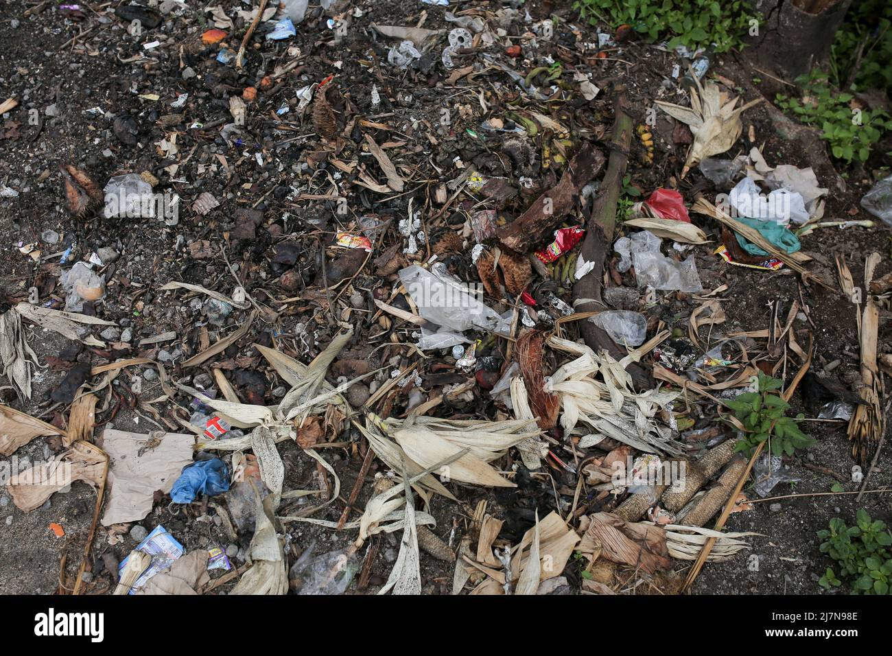trash near the house and started to decompose Stock Photo - Alamy