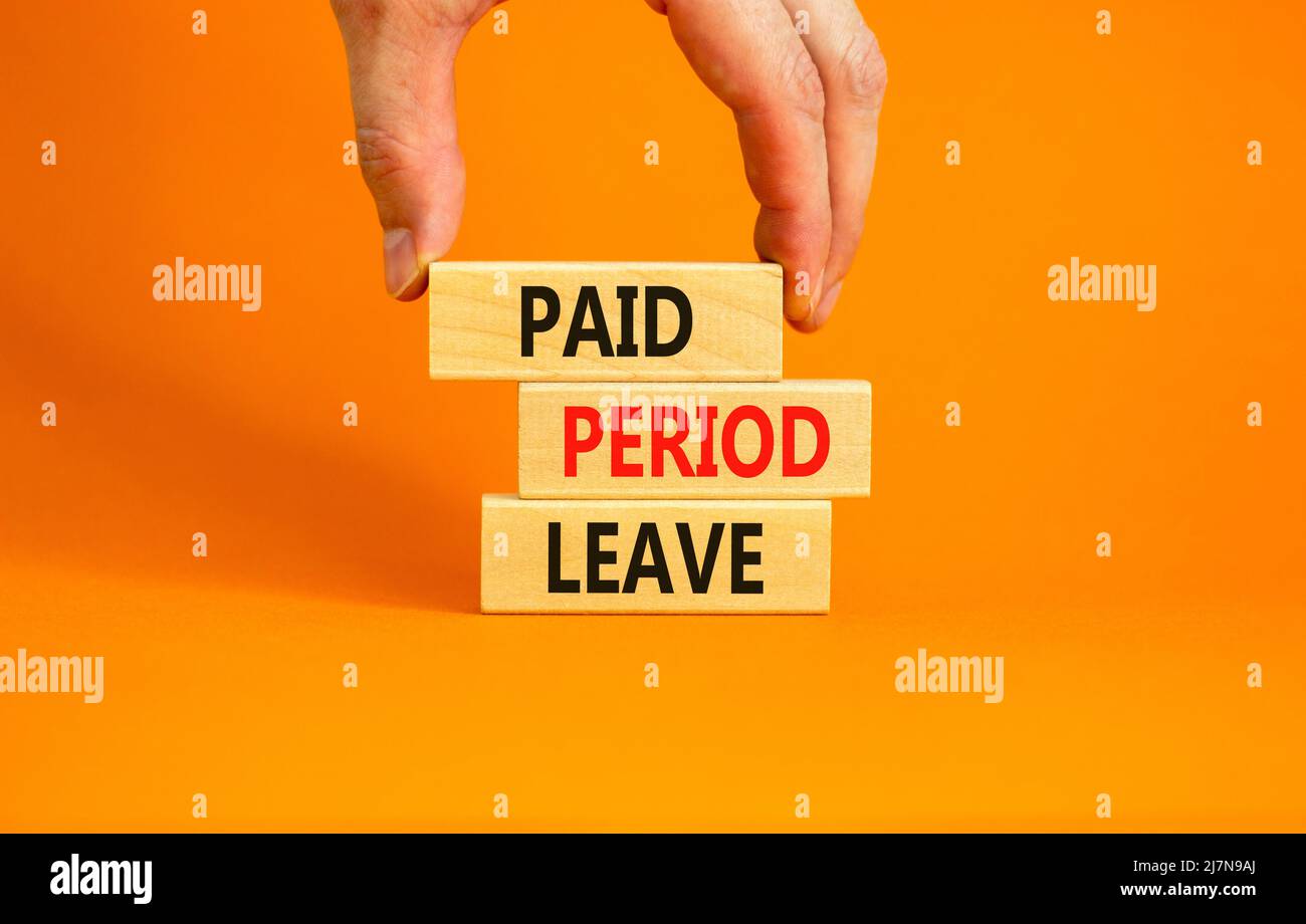 Paid period leave symbol. Concept words Paid period leave on wooden ...