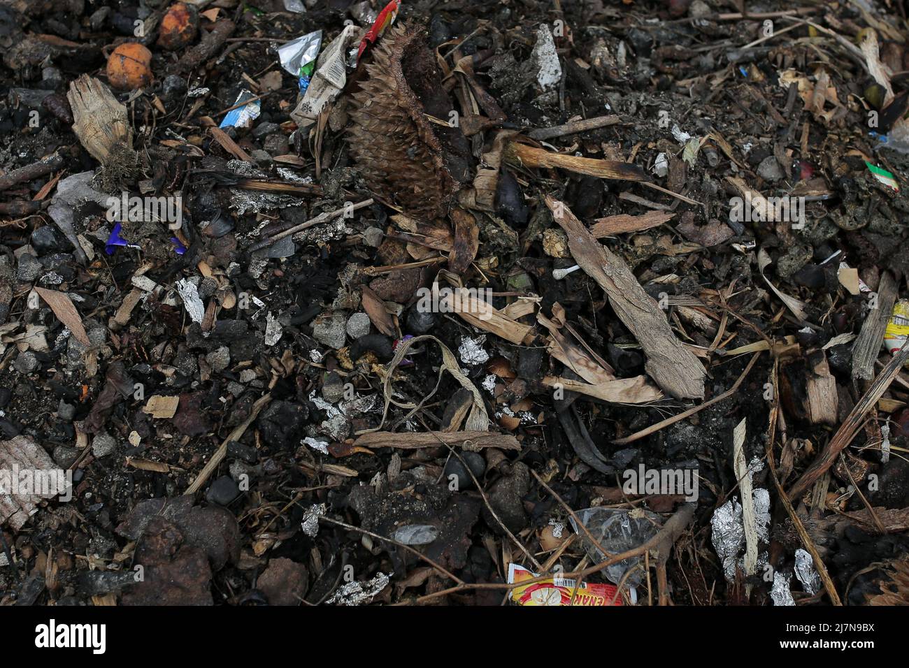 trash near the house and started to decompose Stock Photo - Alamy