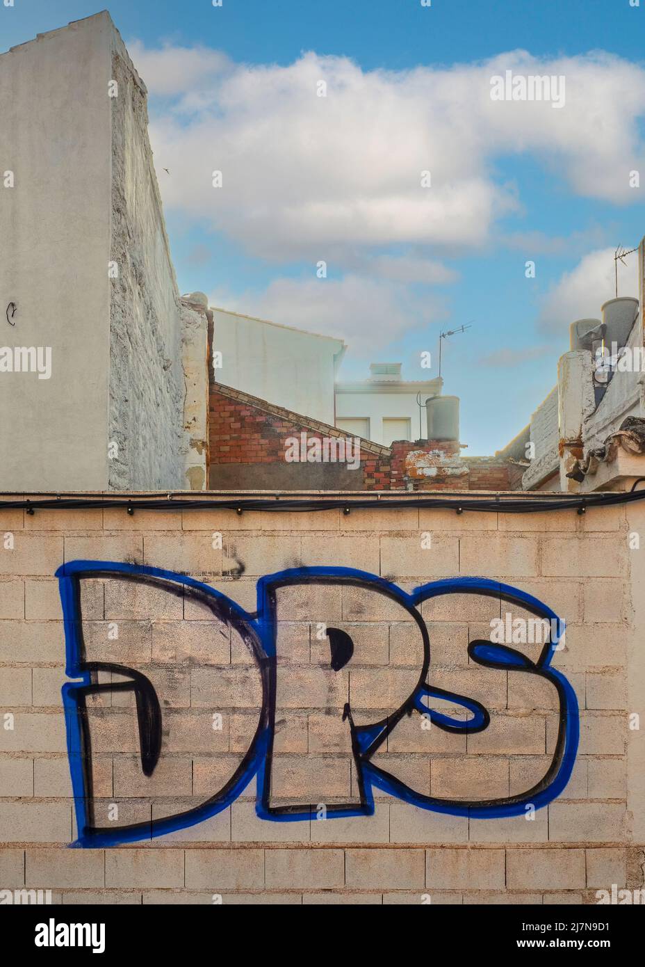 Painted with big letters on a brick wall Stock Photo - Alamy