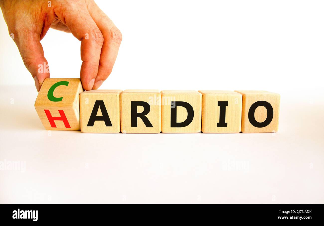 Cardio or hardio symbol. Businessman turns wooden cubes and changes ...