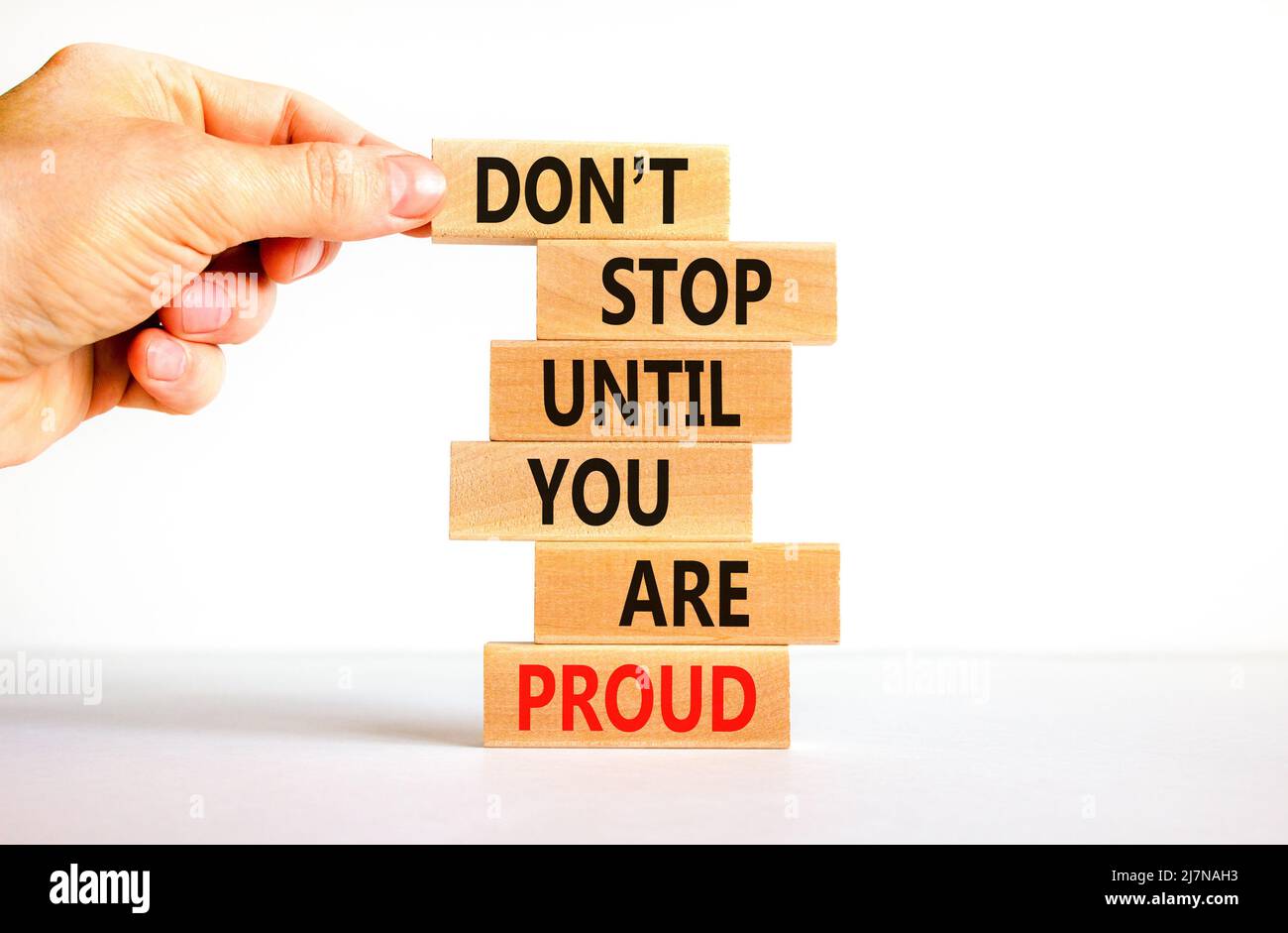 Motivation and inspiration symbol. Wood blocks with words Do not stop ...