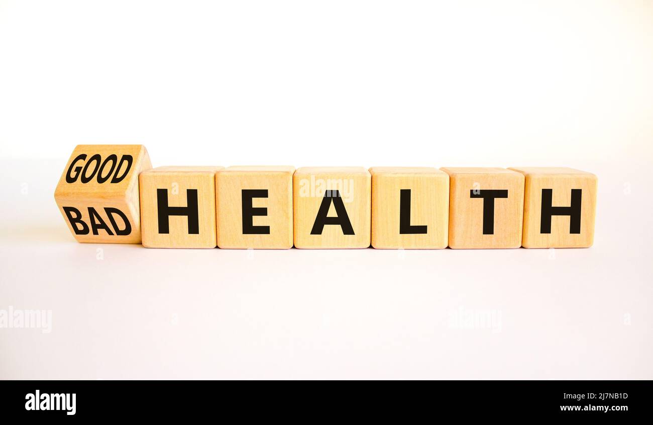 Good or bad health symbol. Turned wooden cubes and changed concept ...