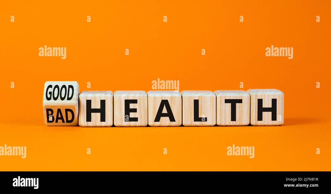 Good or bad health symbol. Turned wooden cubes and changed concept ...