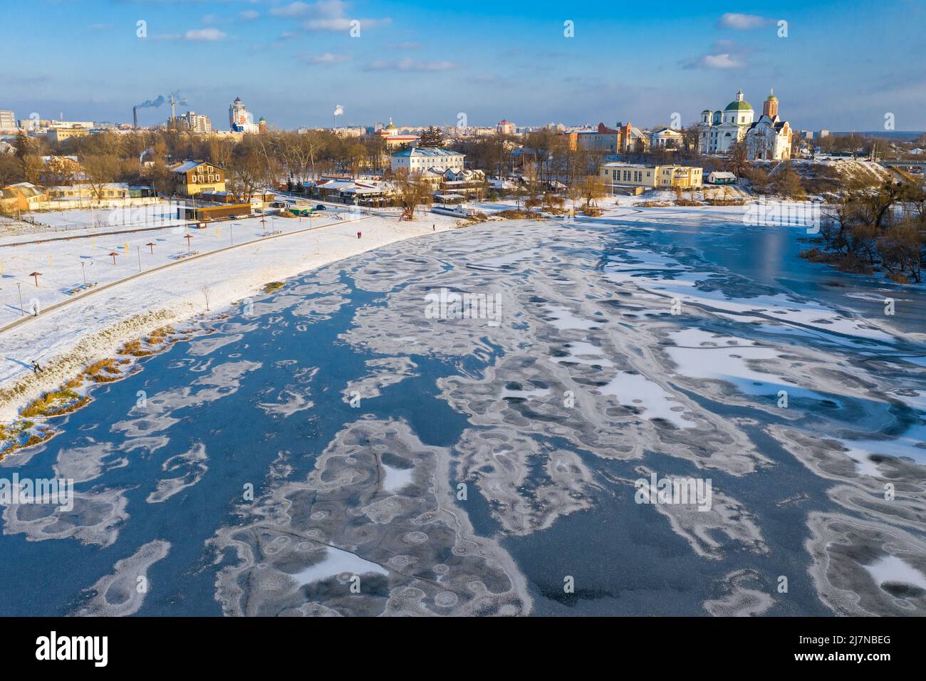 Nice top view of the winter city. Houses and buildings in the snow ...