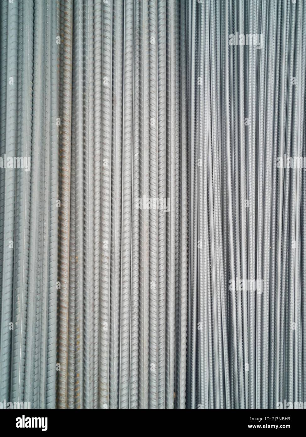 Closeup of concrete reinforcement steel rods in warehouse. Steel rods ...